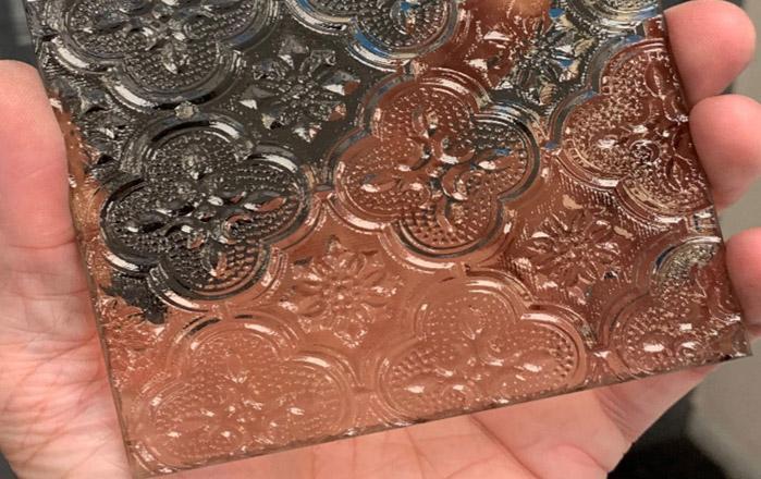 Lapping flat a raised patterned square of glass and polish to full ...